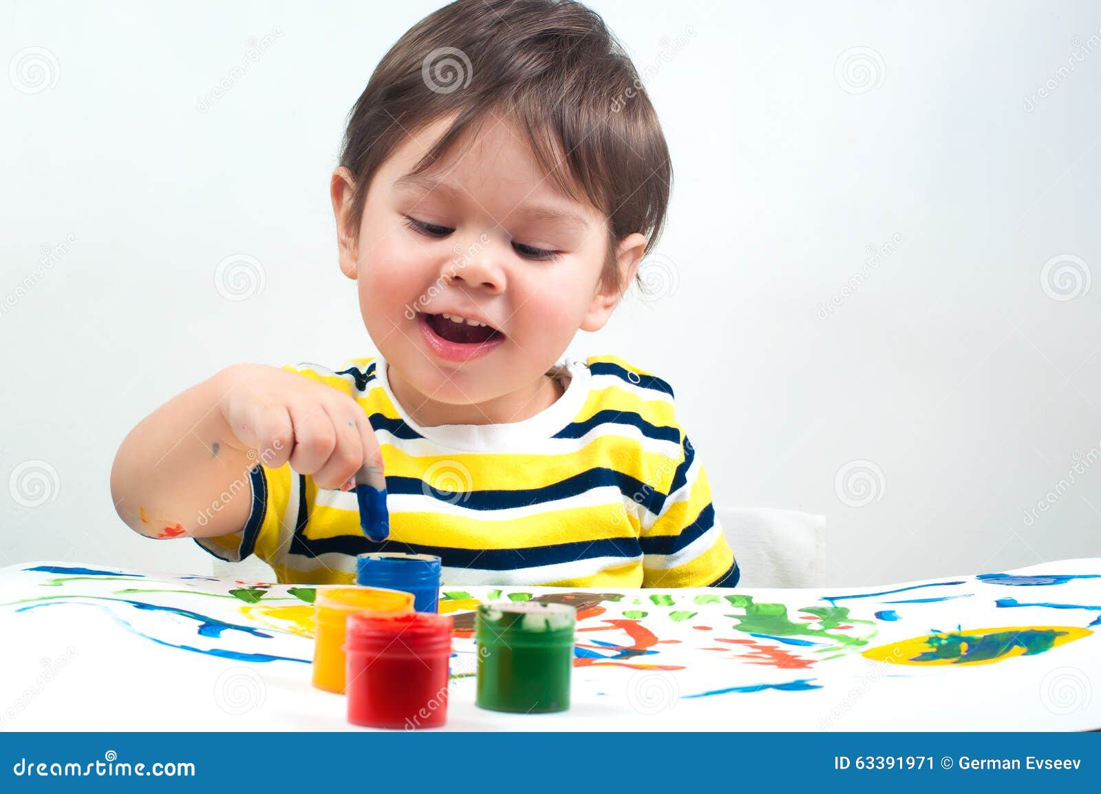 Child draws ink on paper stock image. Image of paint - 63391971