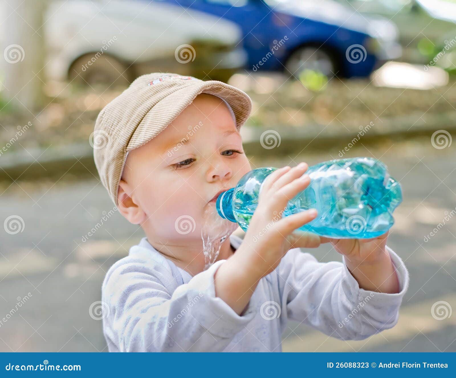 Child drinking from bottle stock image. Image of hidrating - 26088323