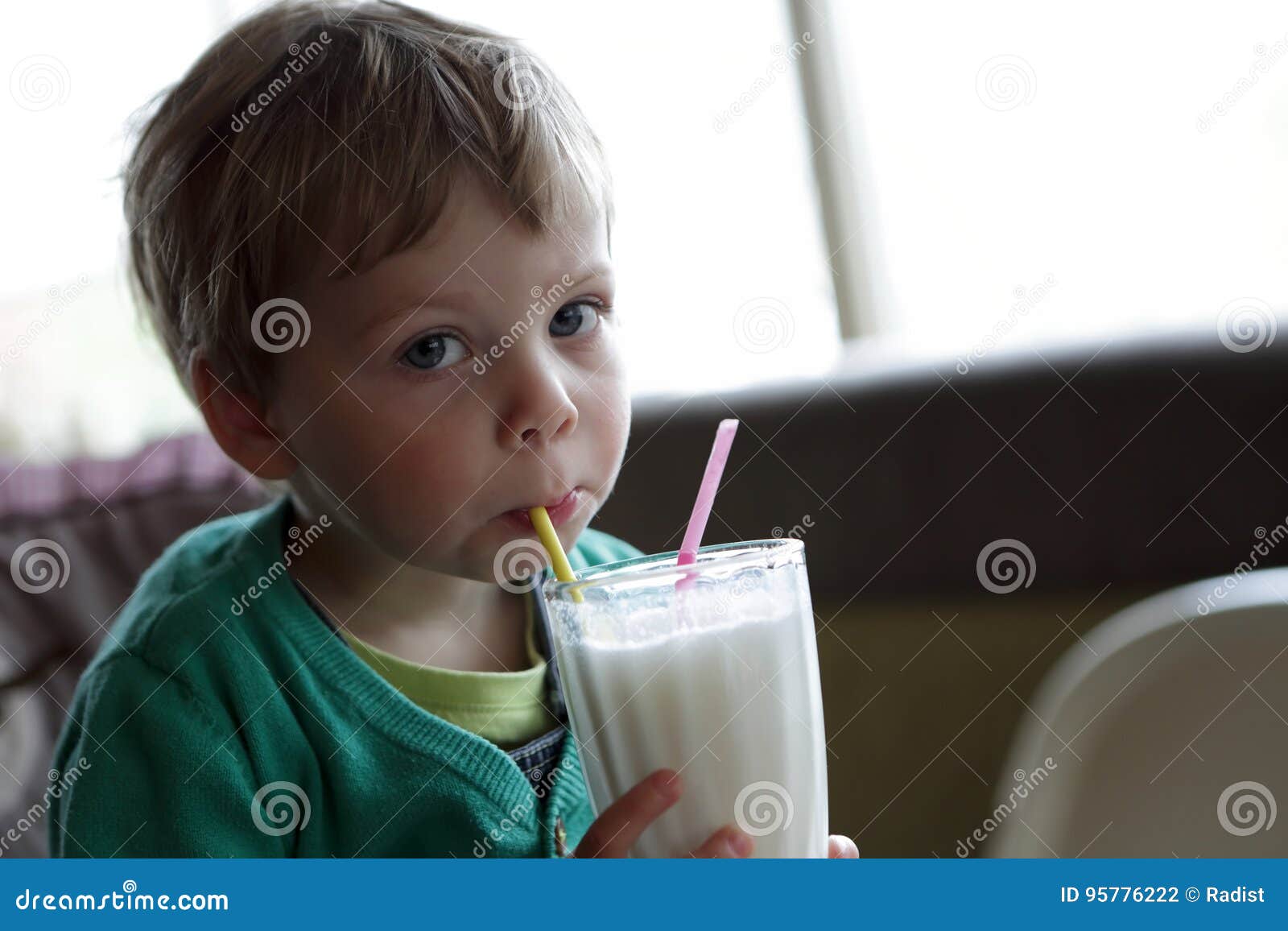 Child drinking milkshake stock photo. Image of drink - 95776222