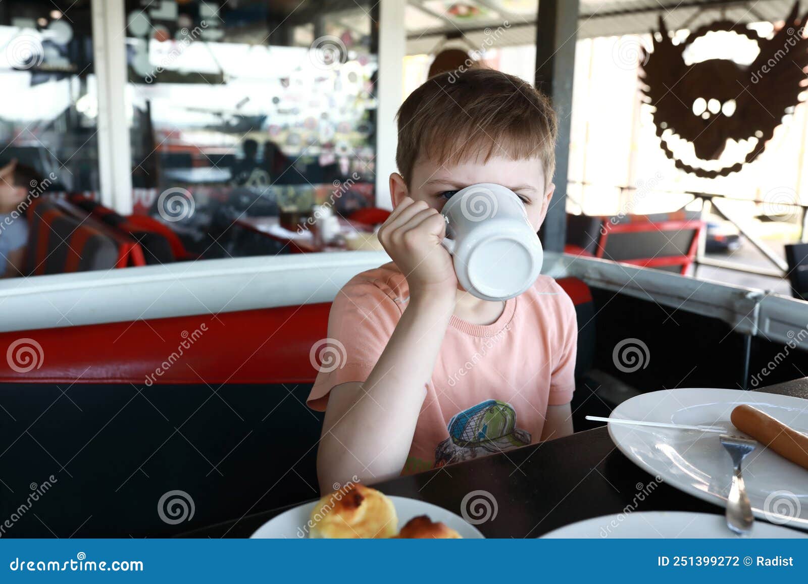 Child Drinking Tea in Restaurant Stock Photo - Image of childhood ...