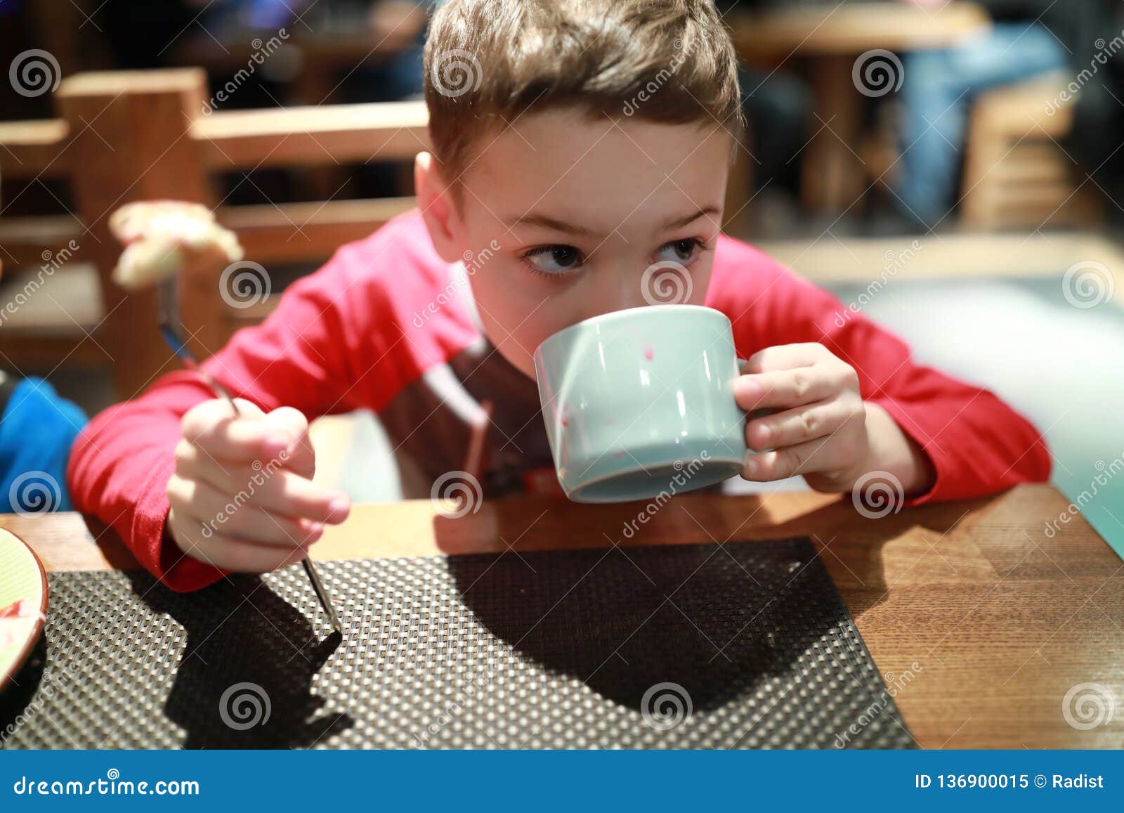 Child drinking tea stock image. Image of care, leisure - 136900015