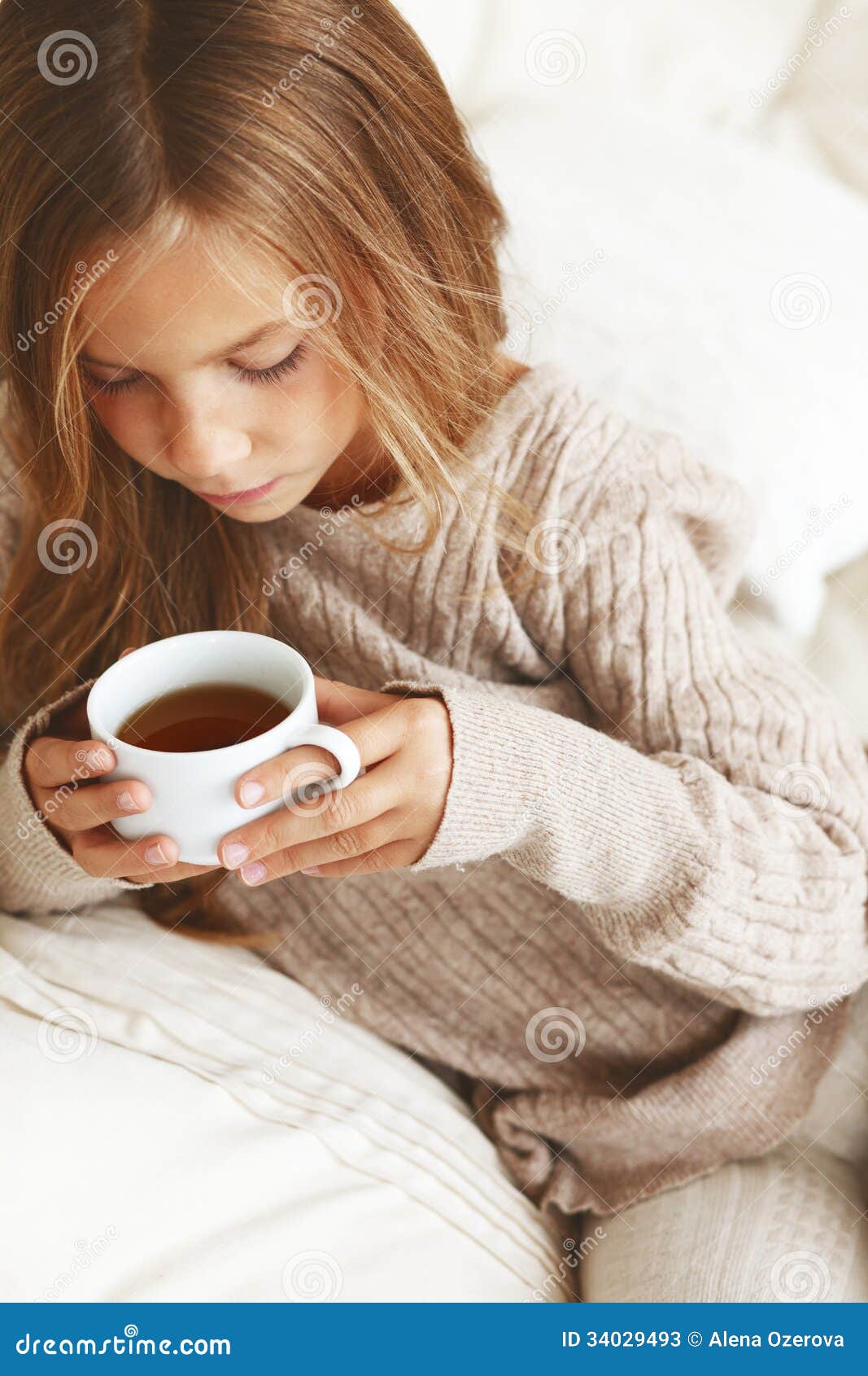 Child drinking tea stock image. Image of childhood, comfortable - 34029493