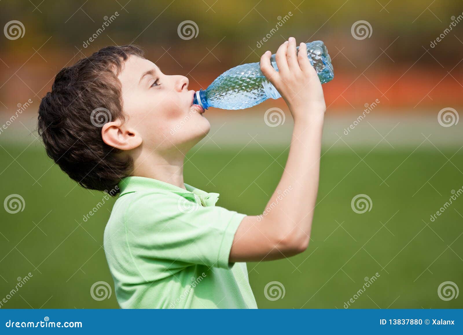 Child drinking water stock photo. Image of drink, meadow - 13837880