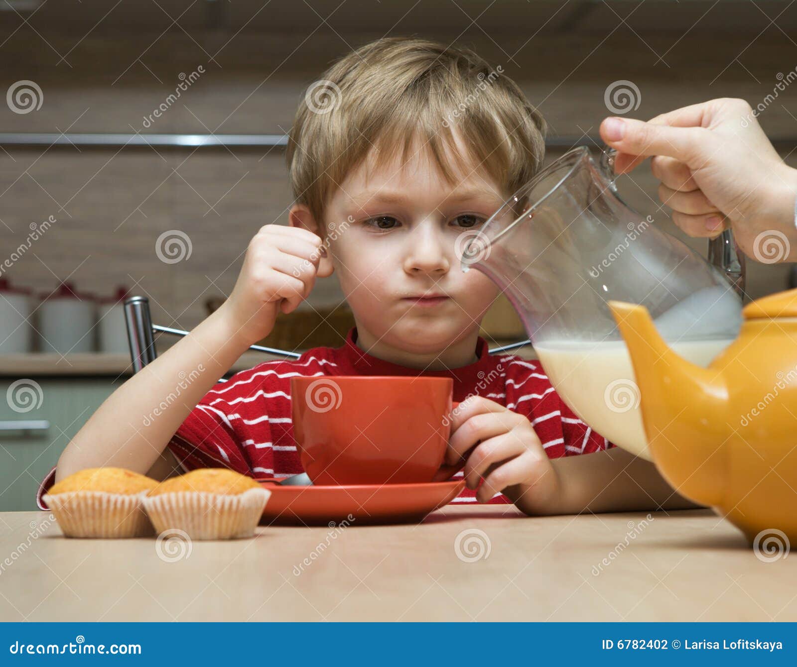 Child drinks tea with milk stock photo. Image of breakfast - 6782402