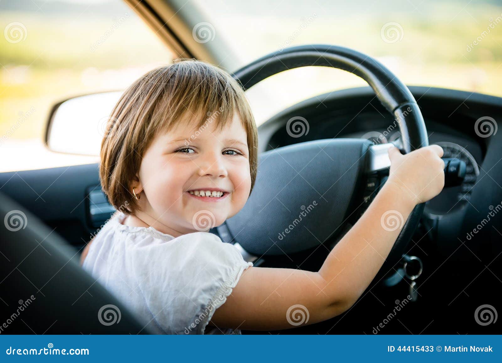 Child driving car stock image. Image of inside, smile - 44415433