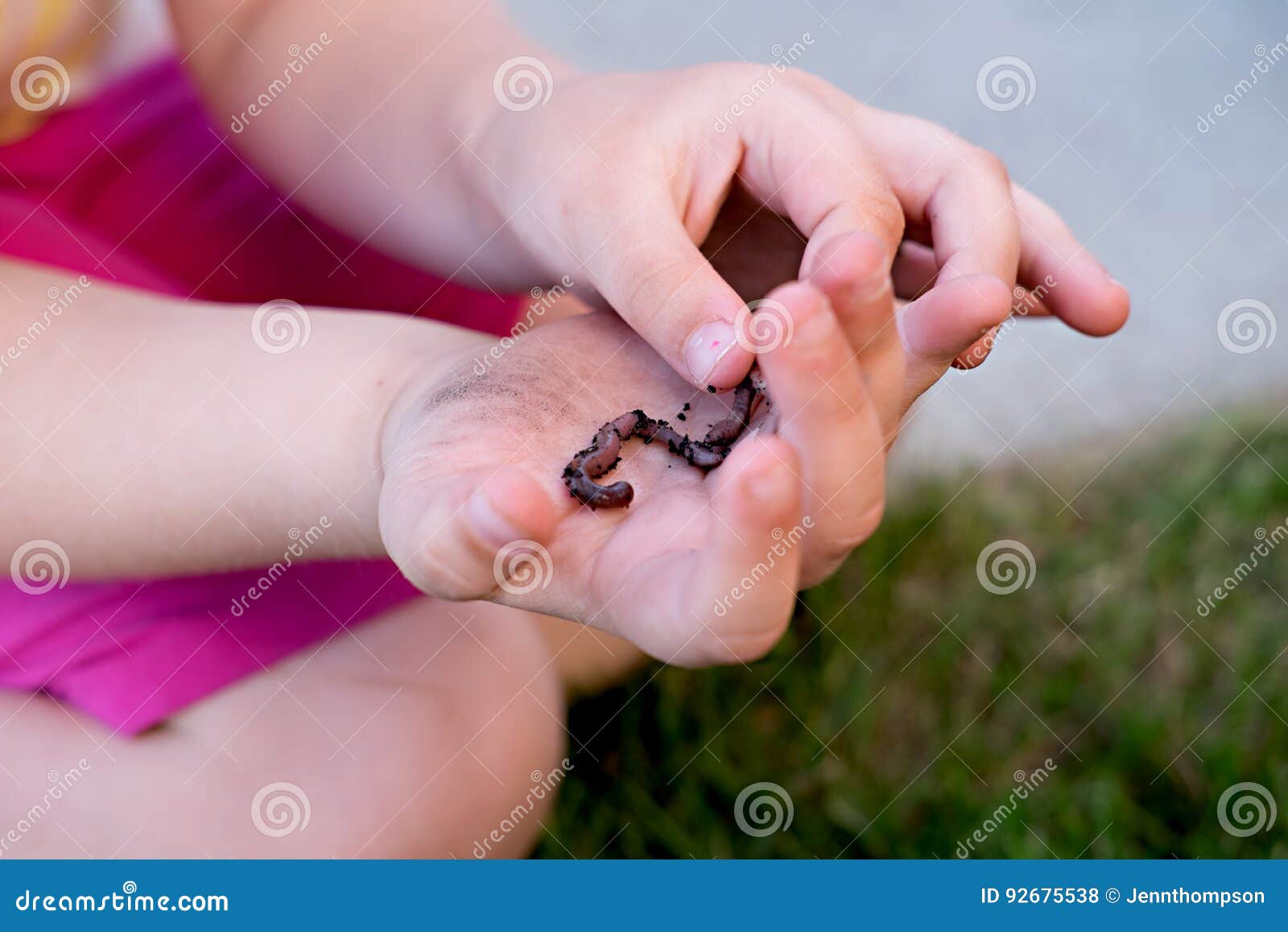 Child with earthworm stock photo. Image of earthworm - 92675538