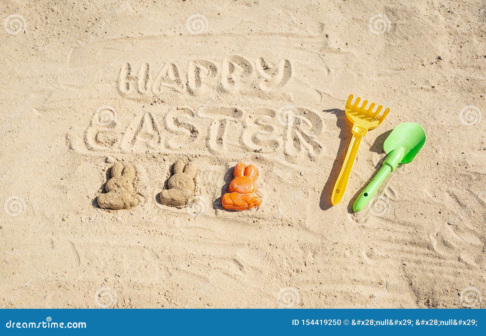 Child Easter Concept on the Warm Sand Stock Photo - Image of letters ...