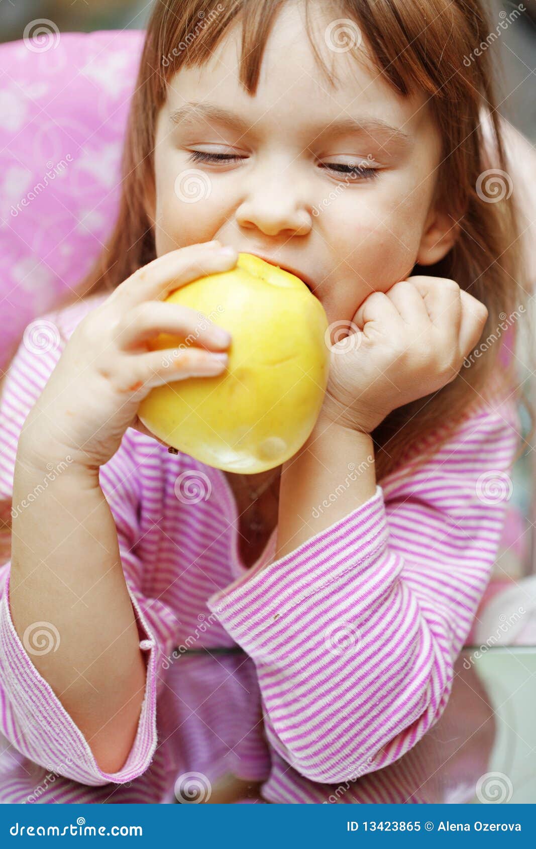 Child eating an apple stock image. Image of close, expression - 13423865