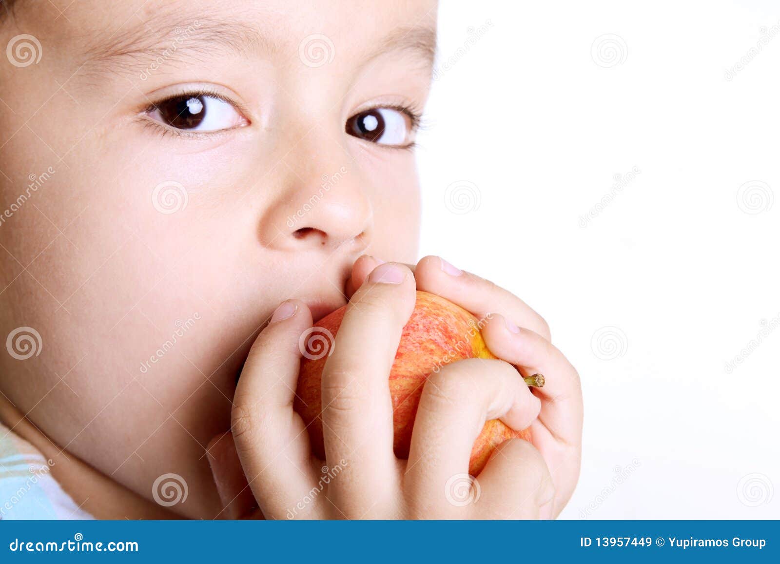 Child eating apple stock image. Image of caucasian, child - 13957449