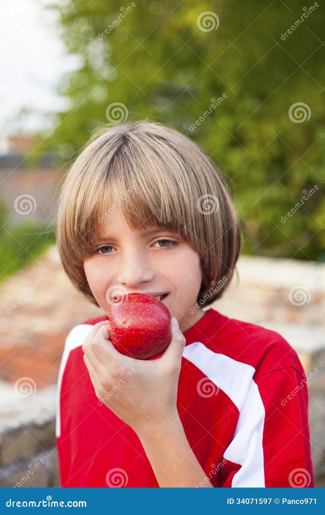 Child eating apple stock image. Image of lifestyle, portrait - 34071597