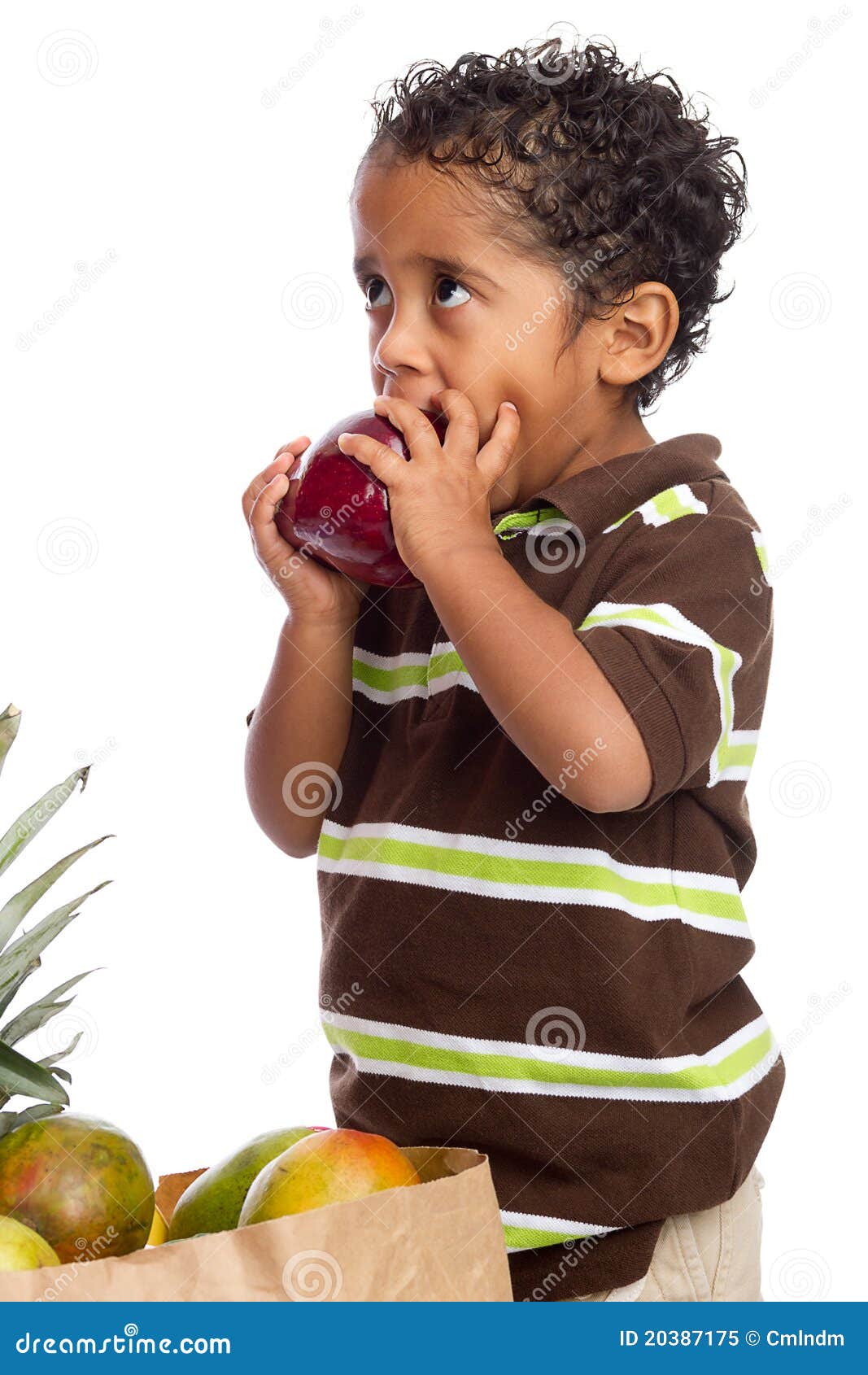 Child Eating Apple Picked from Grocery Bag Stock Image - Image of ...