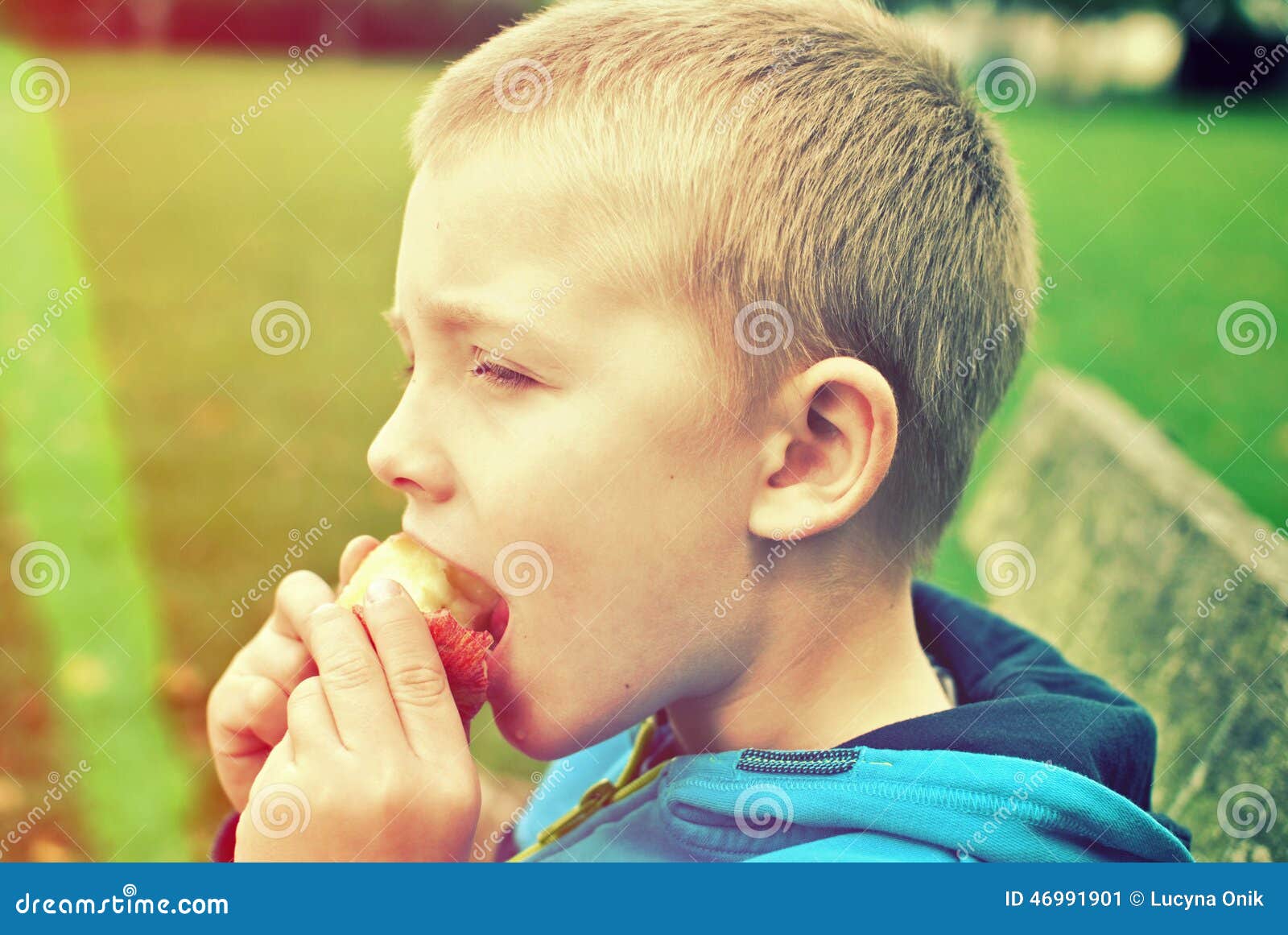 Child eating apple stock image. Image of outdoor, caucasian - 46991901