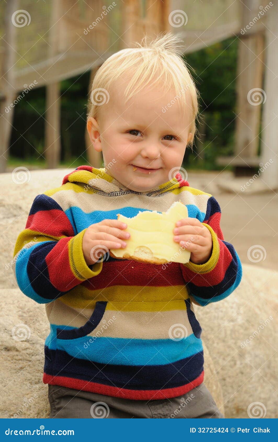 Child eating bread stock photo. Image of cheese, child - 32725424