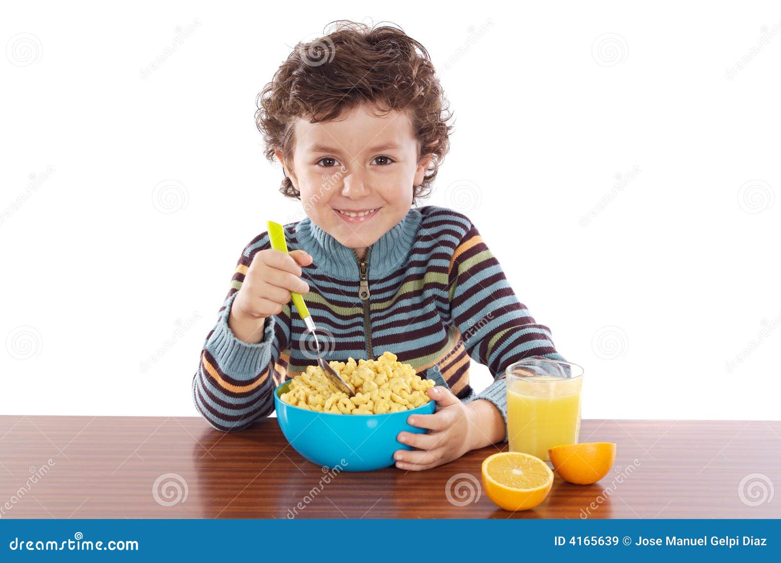 Child eating breakfast stock image. Image of breakfast - 4165639