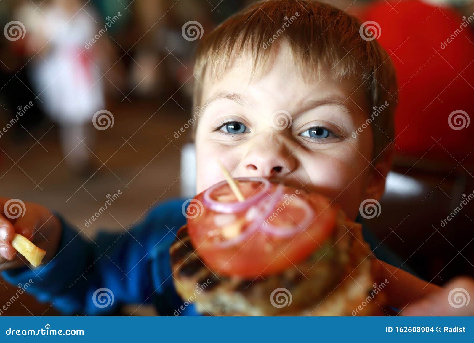 Child eating burger stock photo. Image of burger, appetizing - 162608904