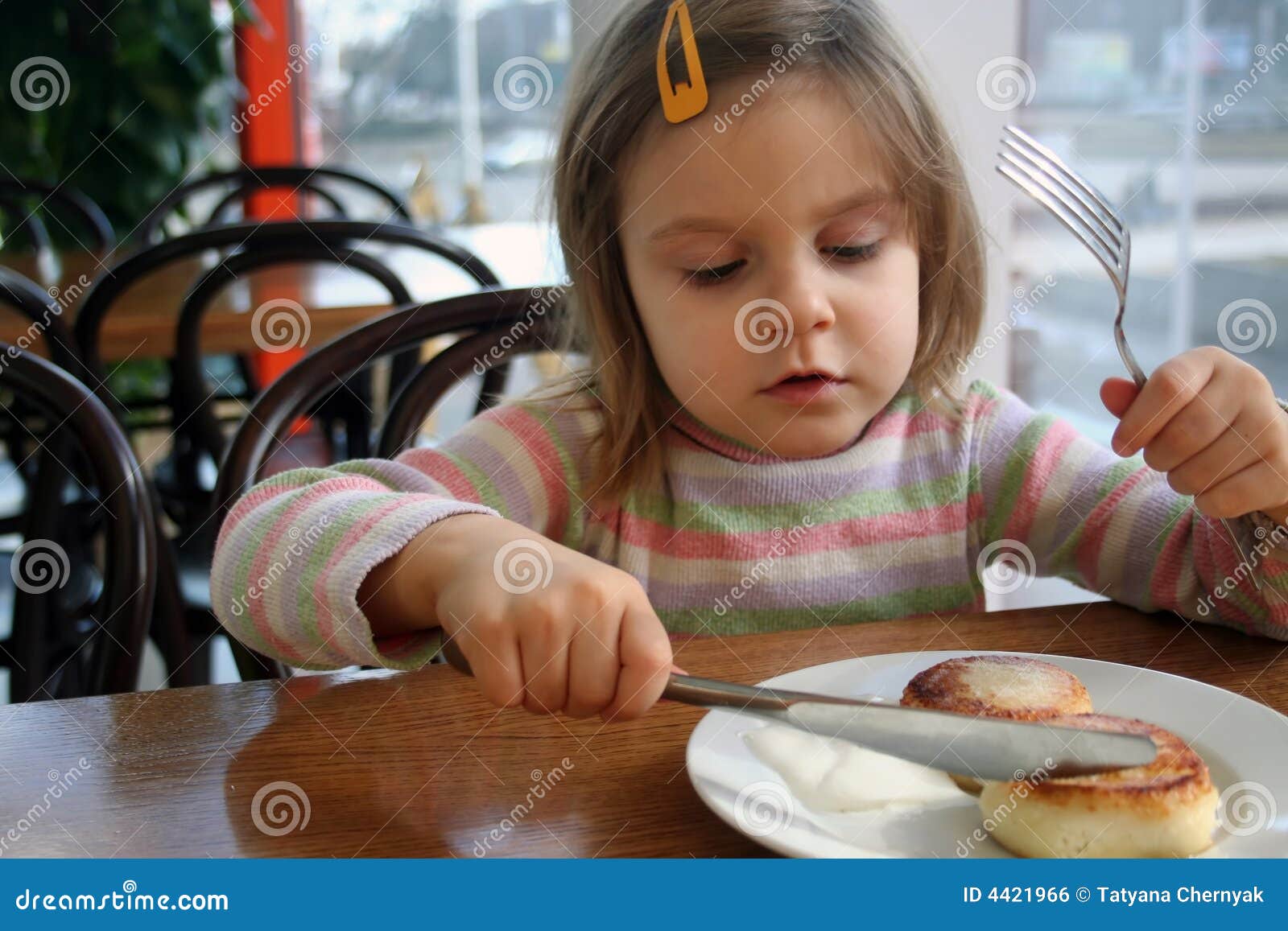 Child eating cheese cake stock photo. Image of plate, nice - 4421966