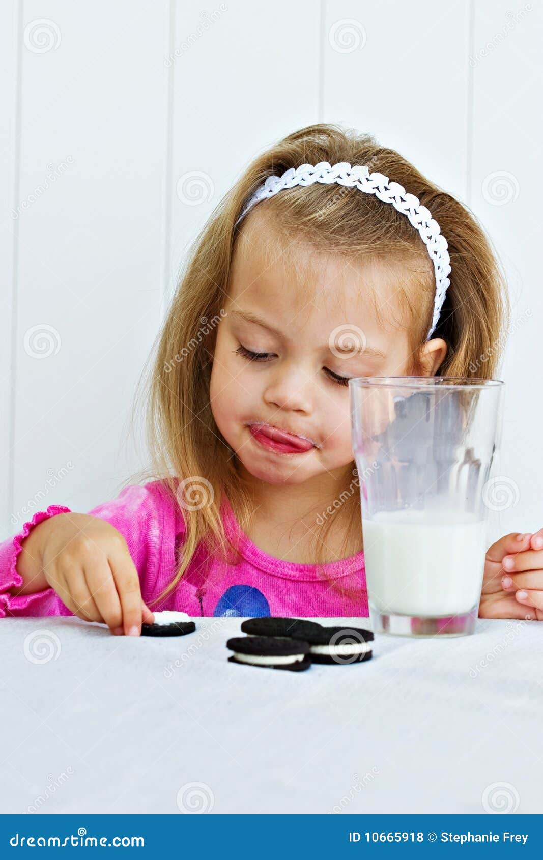Child eating cookies stock photo. Image of child, creme - 10665918
