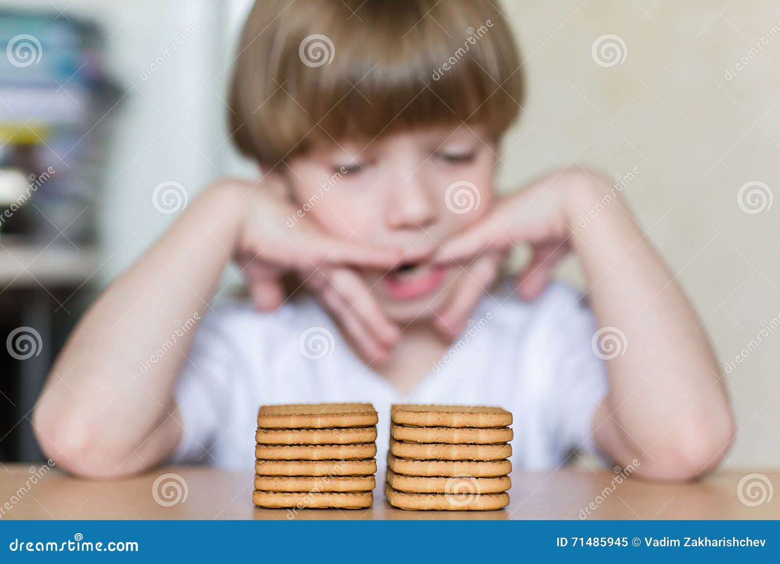 Child eating cookies stock image. Image of happiness - 71485945