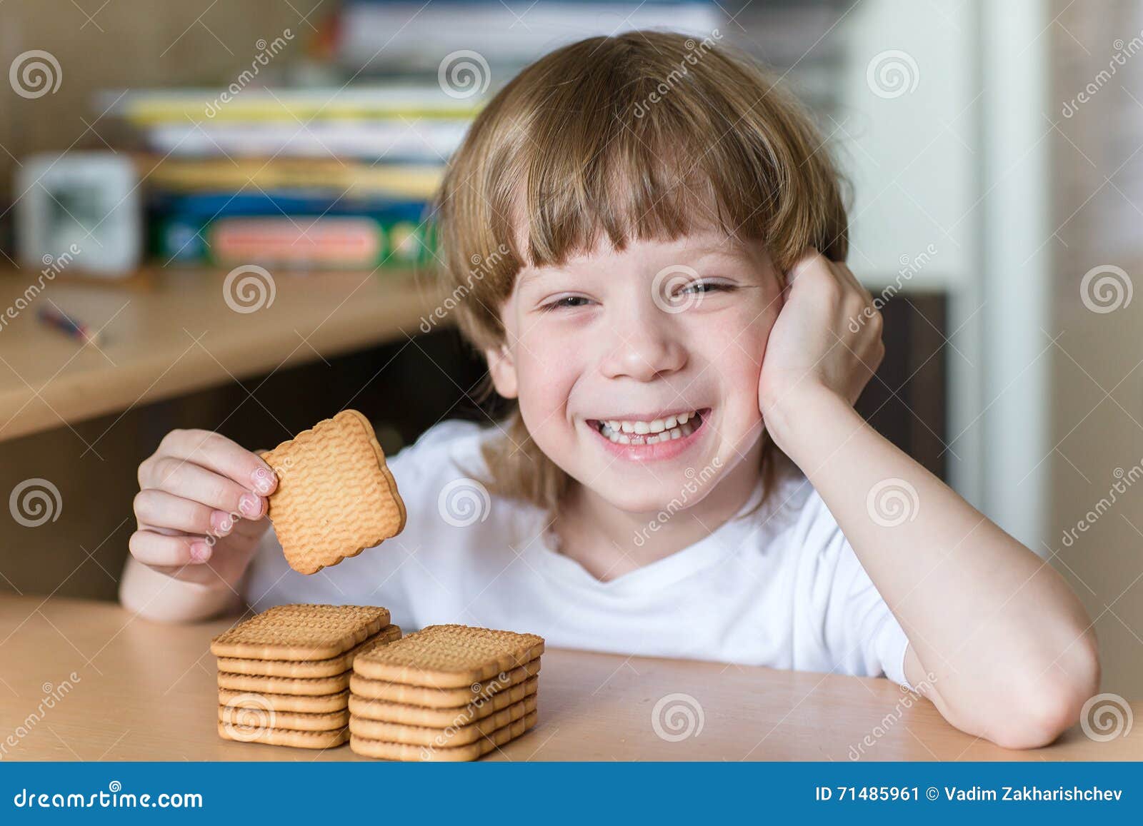 Child eating cookies stock image. Image of portrait, focus - 71485961