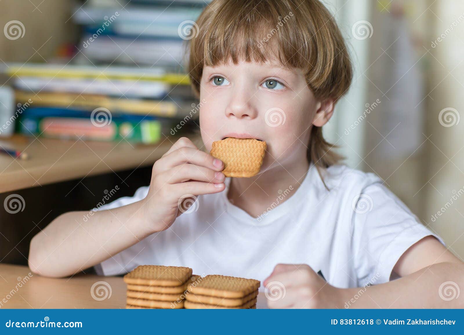 Child eating cookies stock photo. Image of cute, head - 83812618