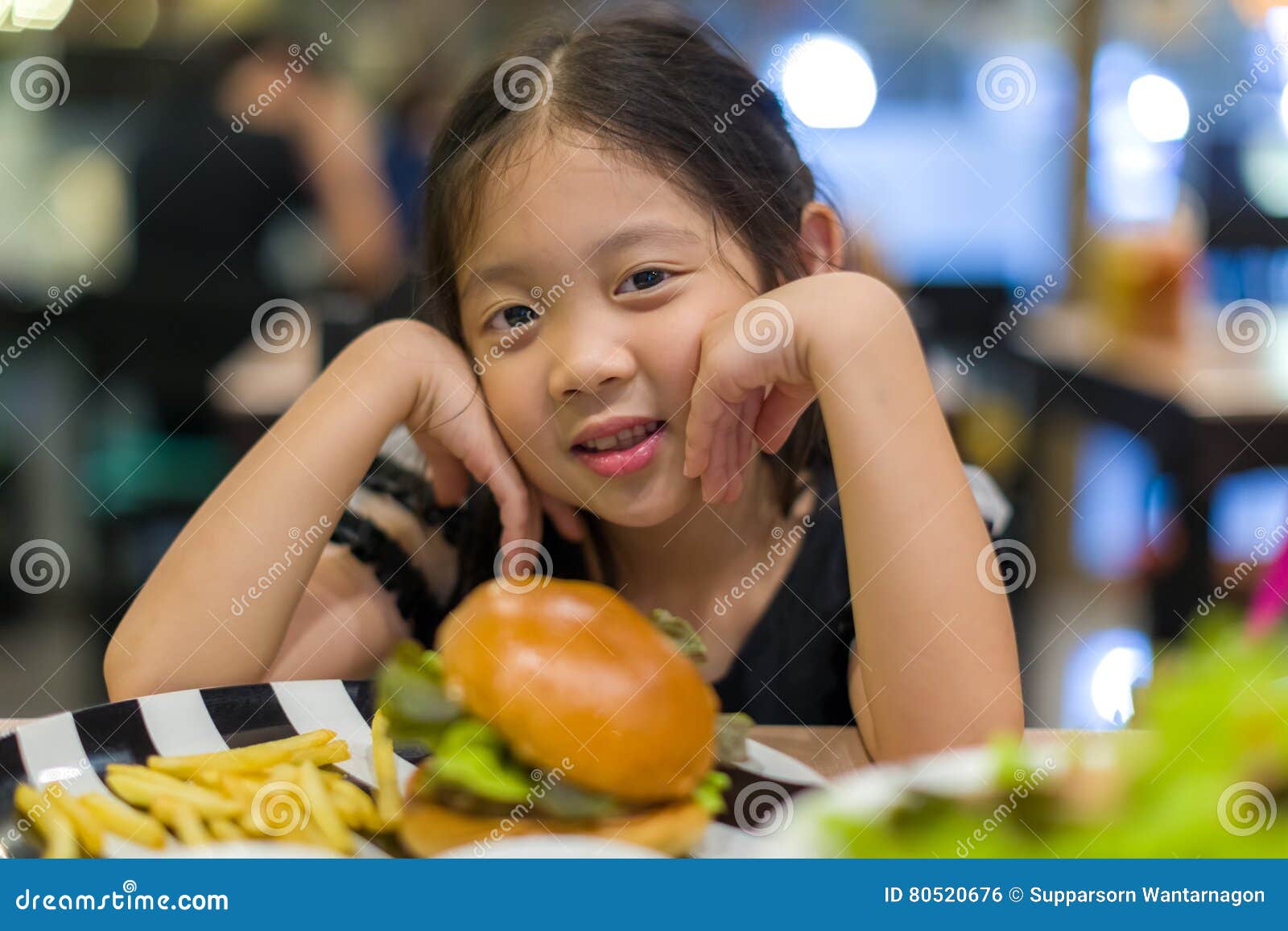 Child Eating Hamburger stock photo. Image of asian, young - 80520676