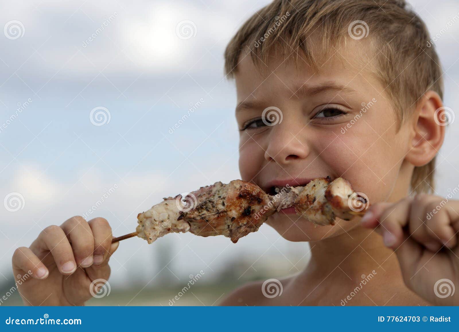 Child eating kebab stock image. Image of eating, meat - 77624703