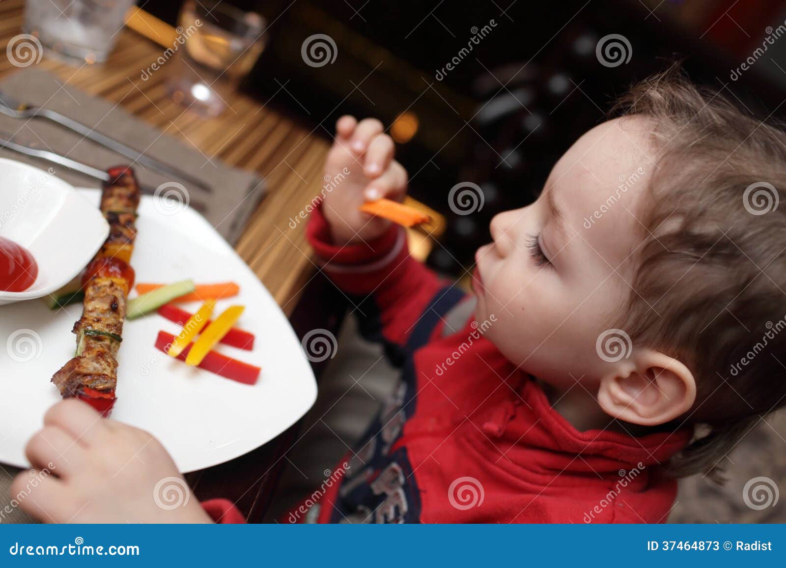 Child eating kebab stock image. Image of dinner, food - 37464873