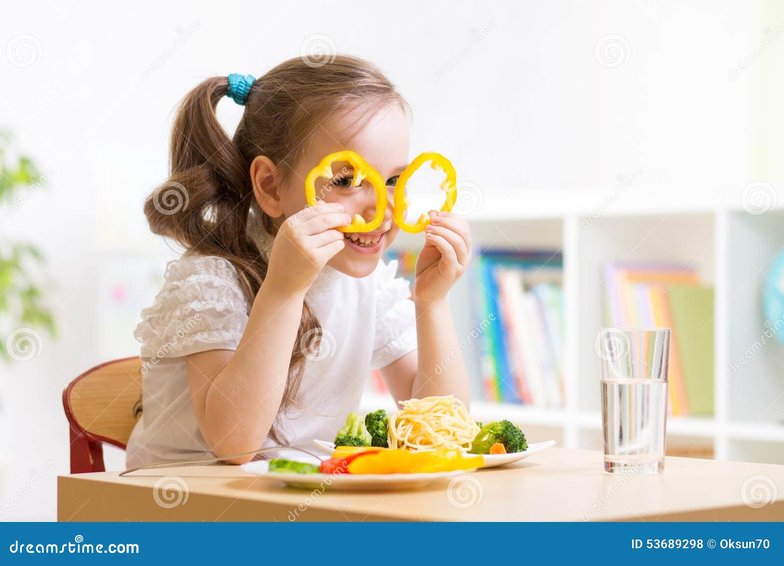 Child Eating in Kindergarten Stock Photo - Image of eyes, little: 53689298