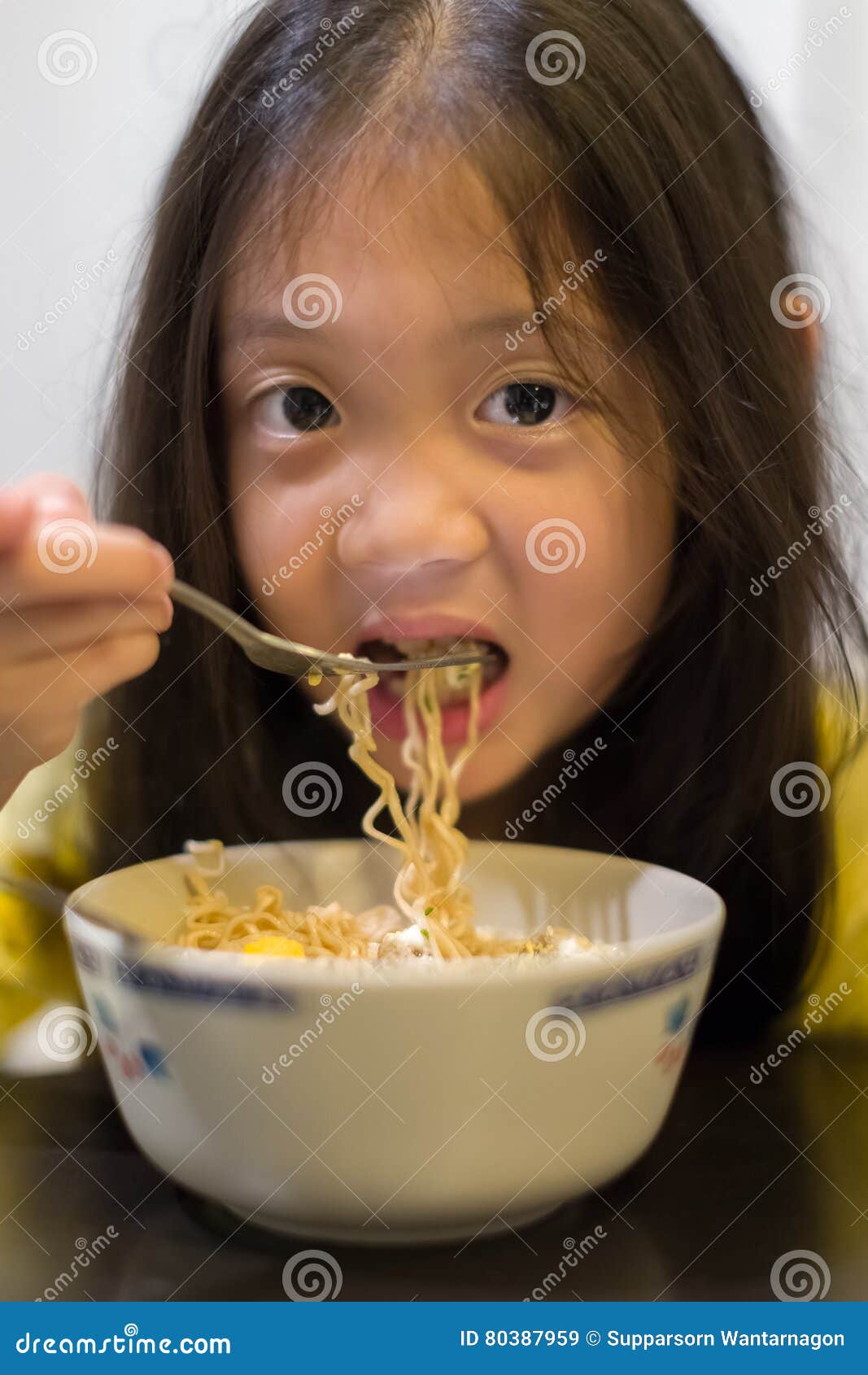 Child Eating Noodle stock image. Image of chinese, girl - 80387959