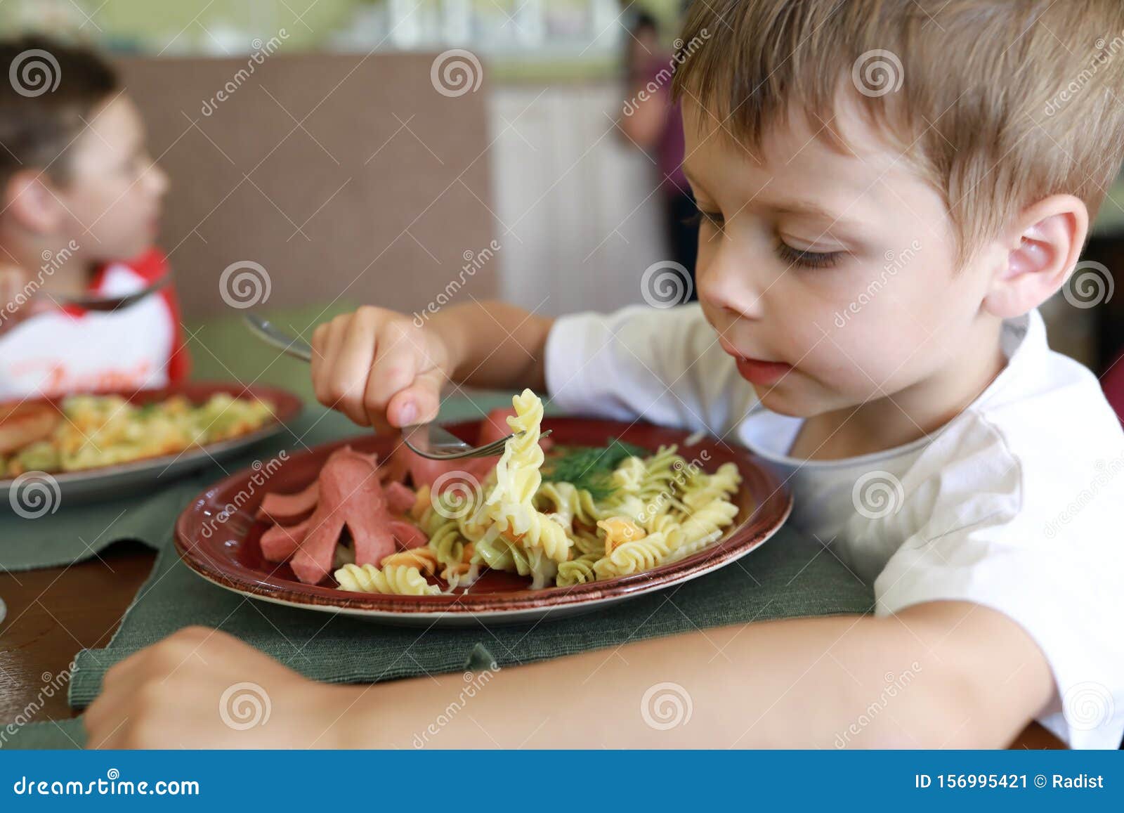 Child Eating Pasta with Sausages Stock Image - Image of appetite ...