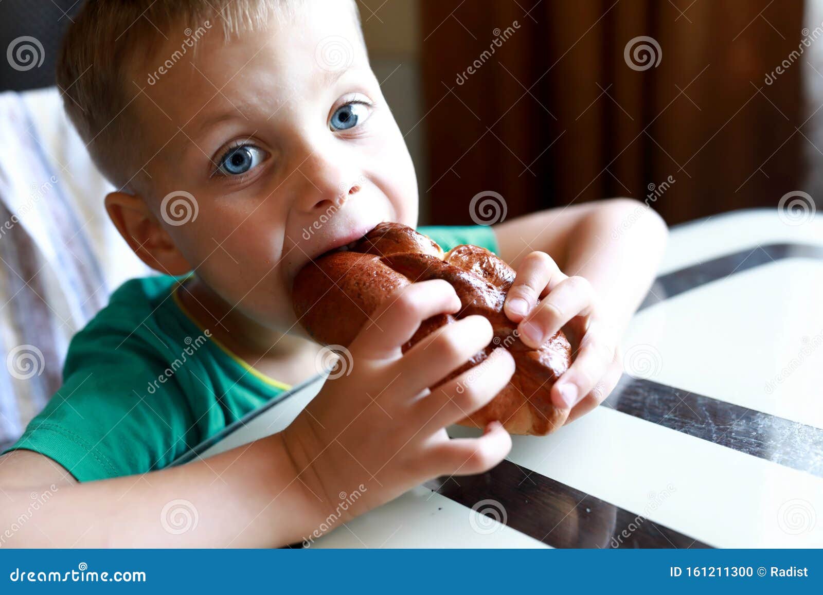 Child eating pie stock photo. Image of indoor, face - 161211300