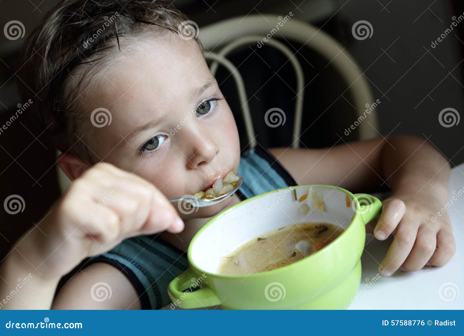 Child eating soup stock photo. Image of kitchen, dinner - 57588776