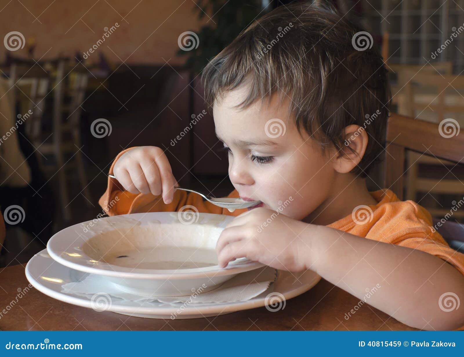 Child eating soup stock image. Image of food, colorful - 40815459