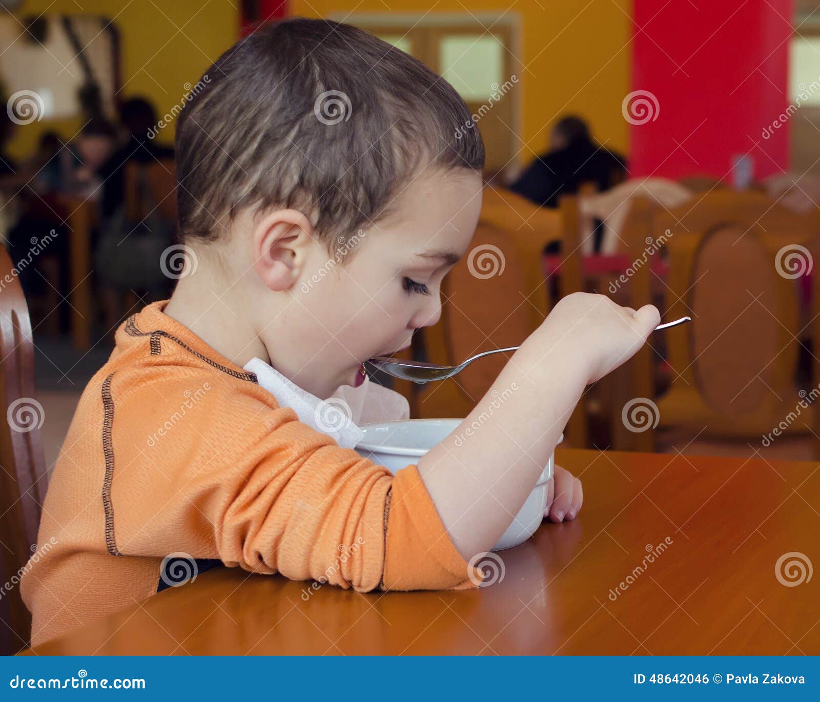 Child Eating Soup in Restaurant Stock Photo - Image of cute ...
