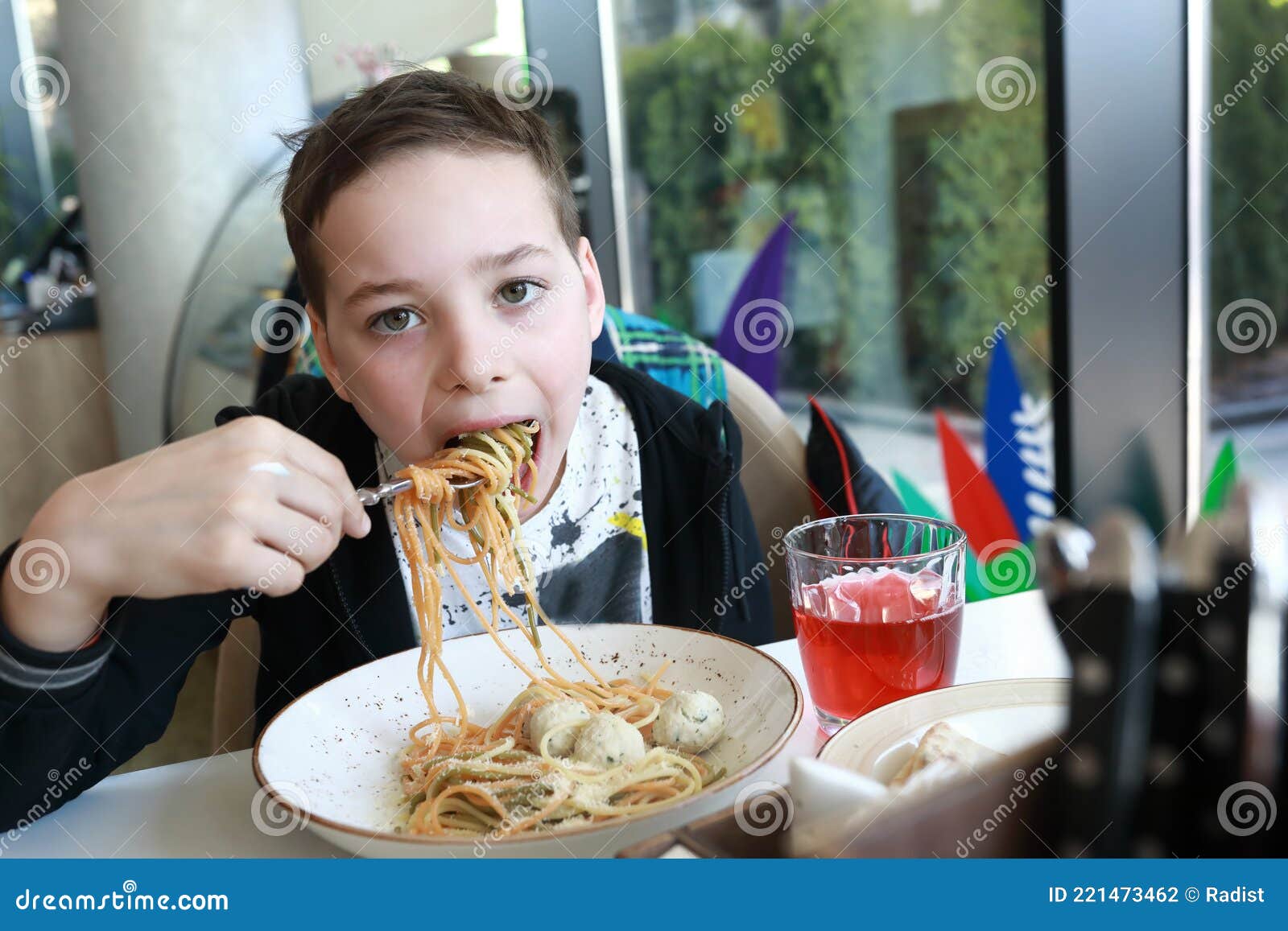 Child Eating Spaghetti with Chicken Meatballs Stock Photo - Image of ...