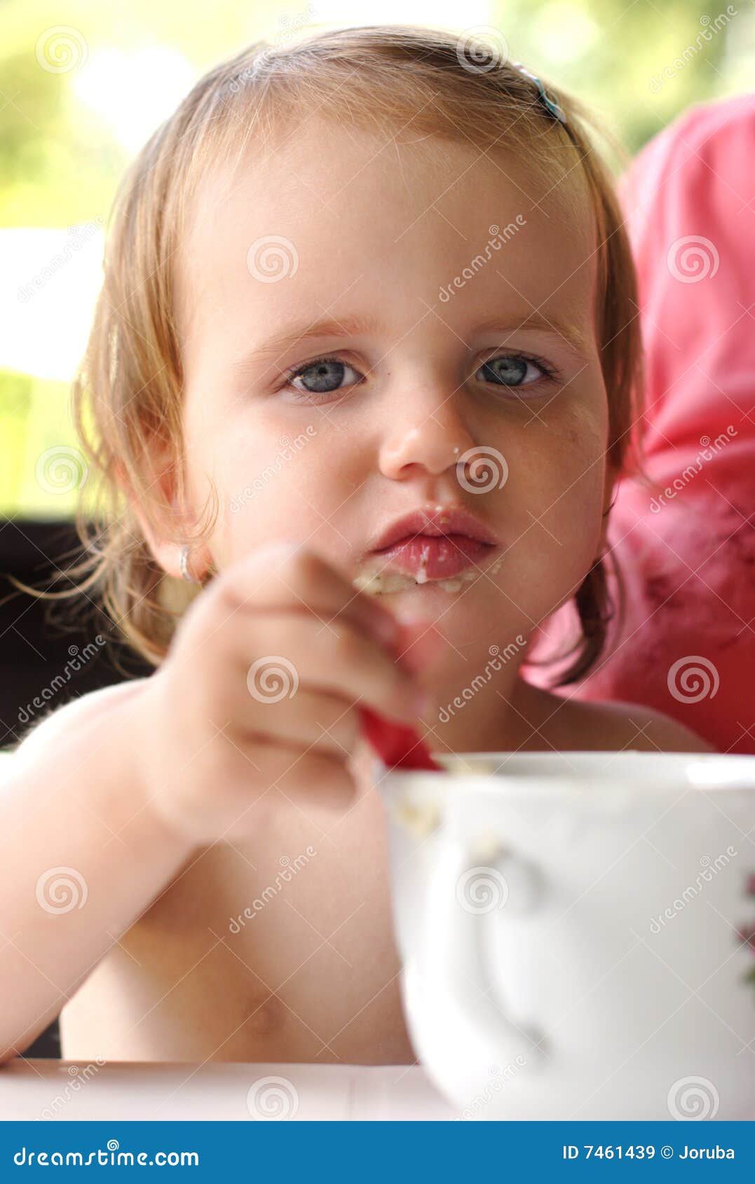 Child eating with spoon stock image. Image of caucasian - 7461439