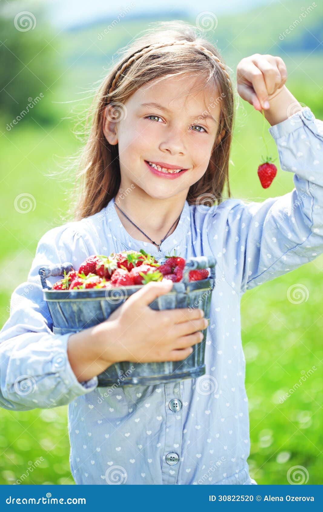 Child Eating Strawberries in a Field Stock Photo - Image of elementary ...