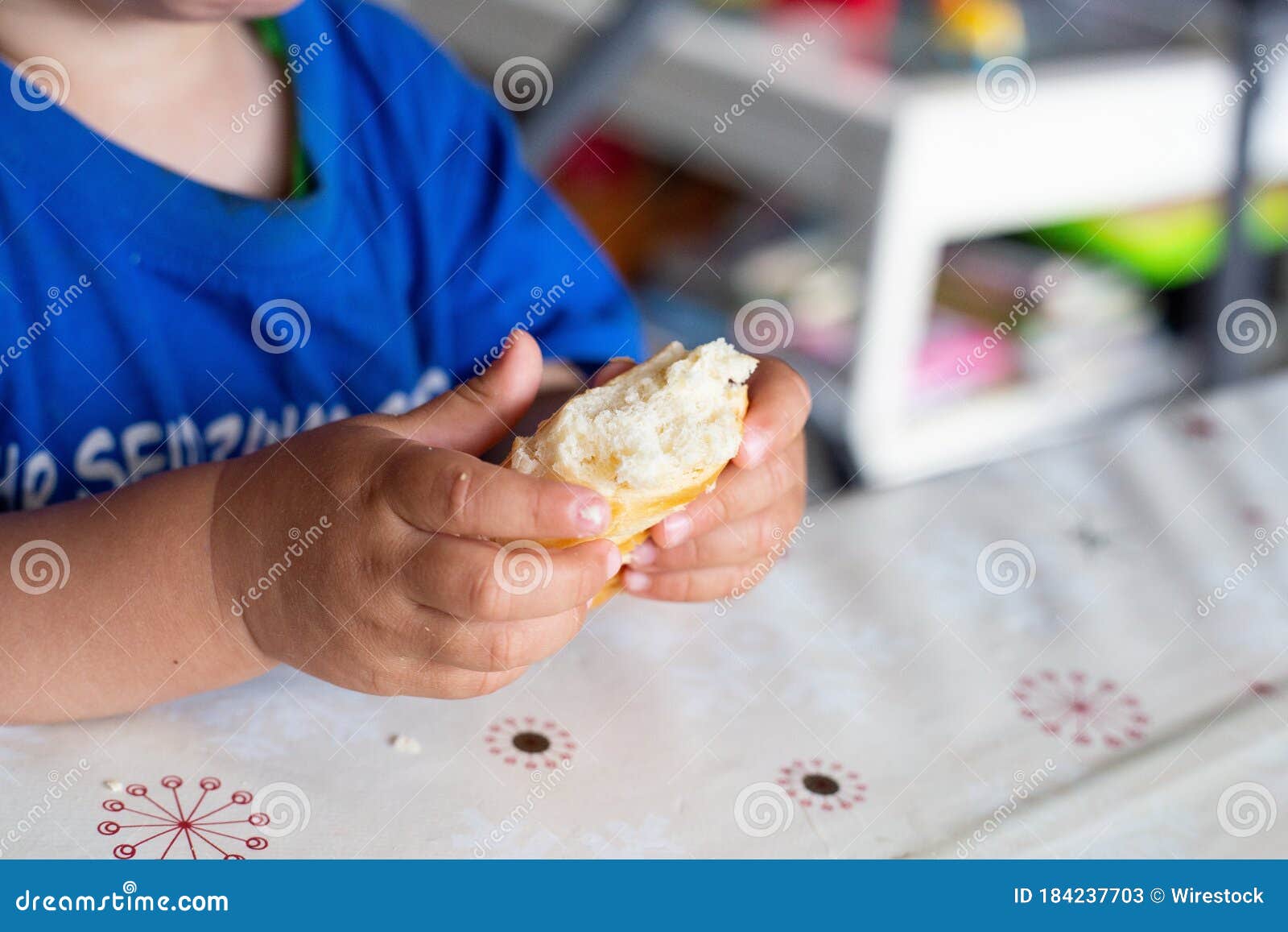 Child Eating Sweet Bread by the Desk Stock Image - Image of baby ...