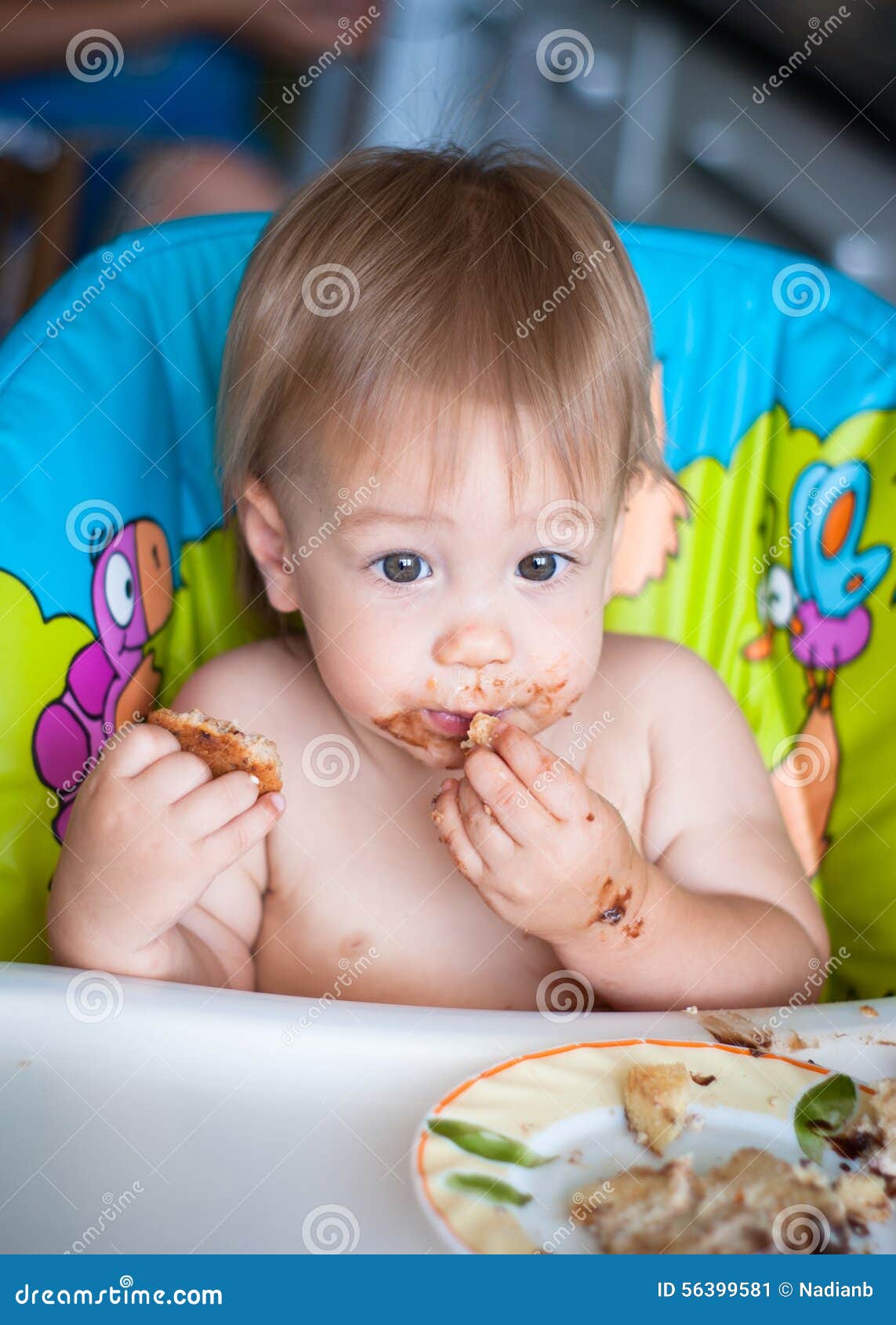 Child Eats Cake in the Highchair Stock Image - Image of happy, cake ...