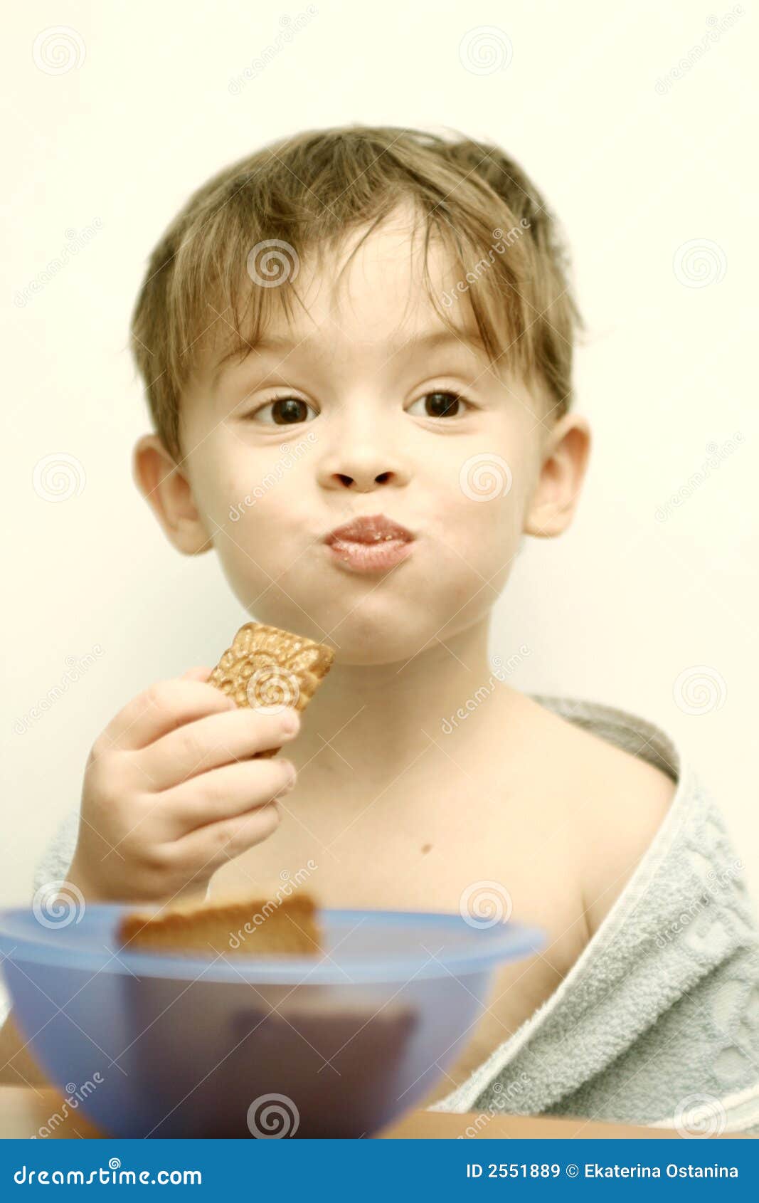 The child eats cookies stock image. Image of lovely, emotions - 2551889
