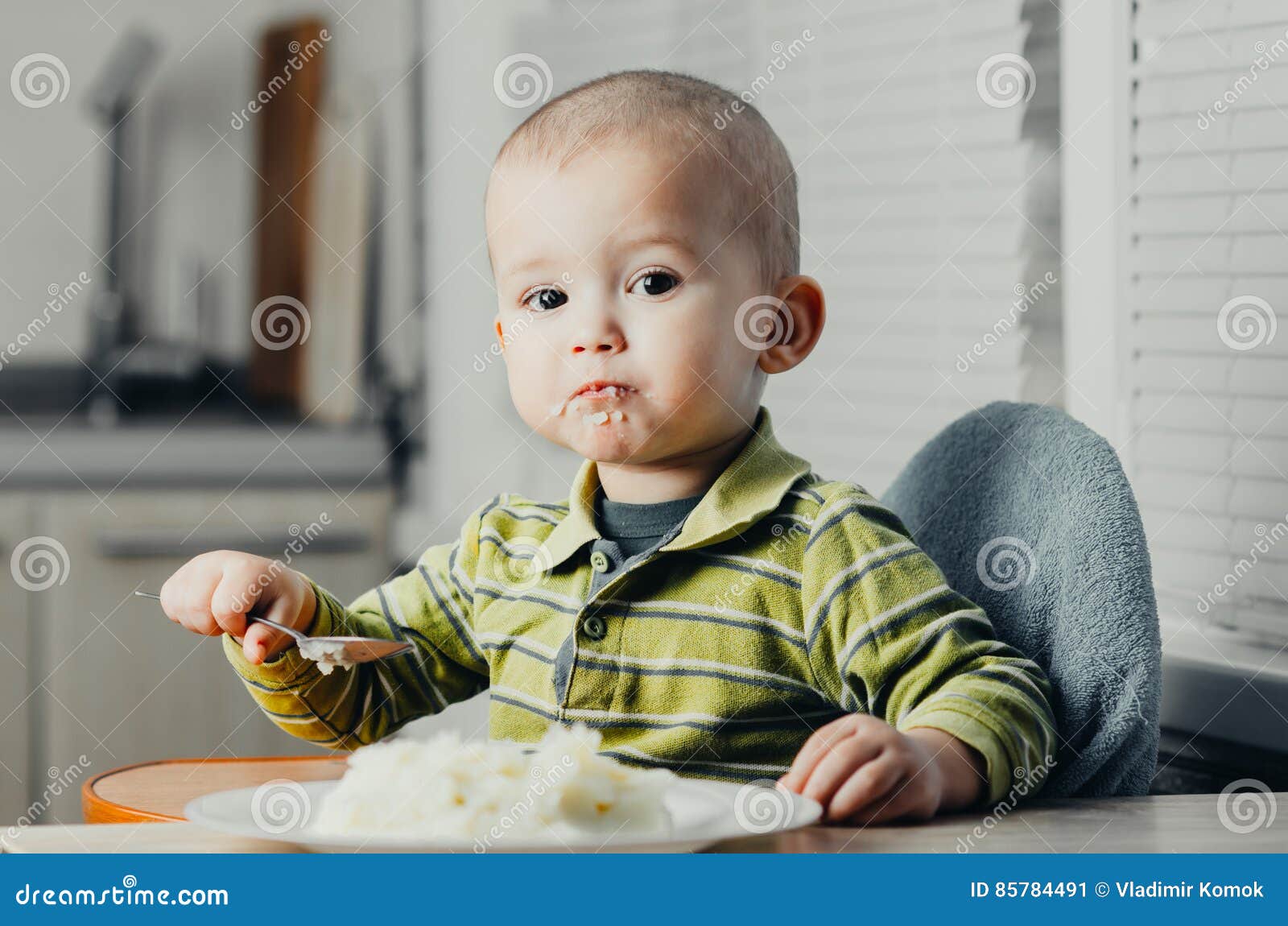 The Child Eats Mashed Potatoes Stock Image - Image of food, face: 85784491