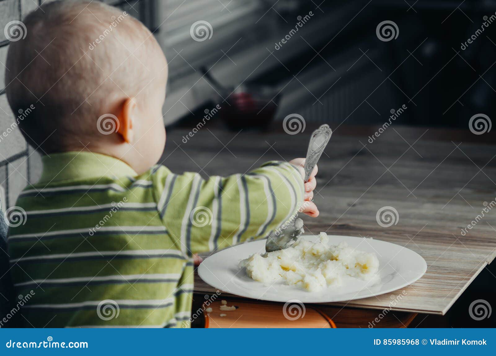 The Child Eats Mashed Potatoes Stock Photo - Image of infant, baby ...