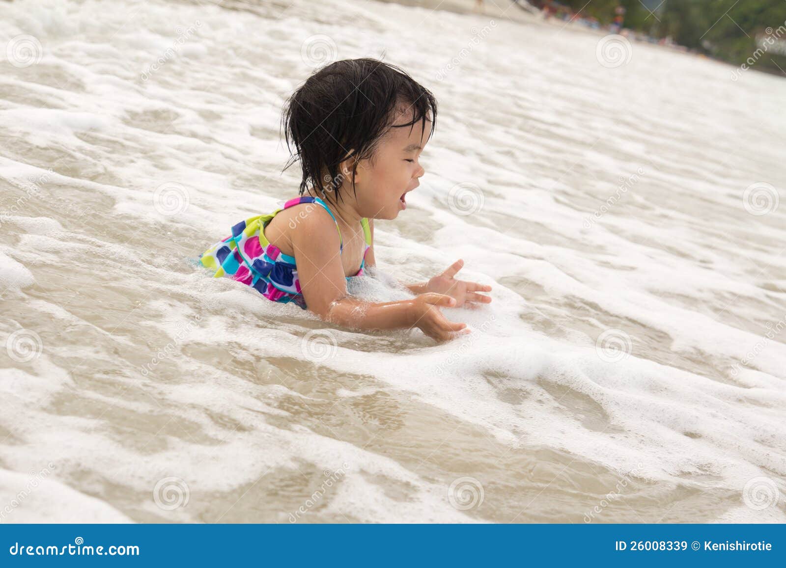 Child enjoy waves on beach stock image. Image of kids - 26008339