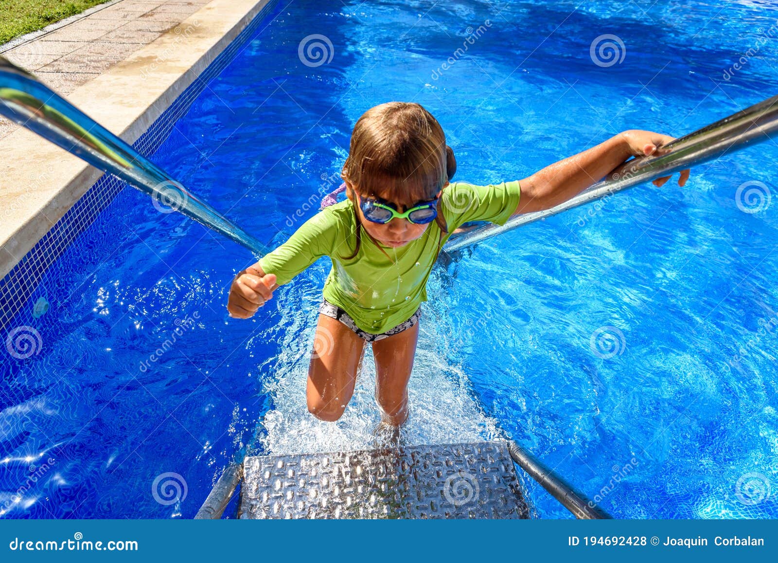 Child Enjoying the Last Days of Summer in a Pool in Full Sun Stock ...