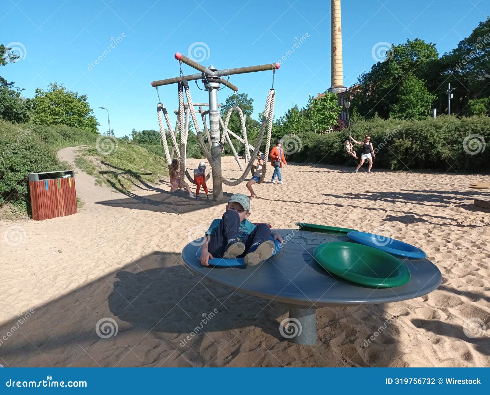 Child Enjoying a Play Table in a Sandbox at a Playground Editorial ...