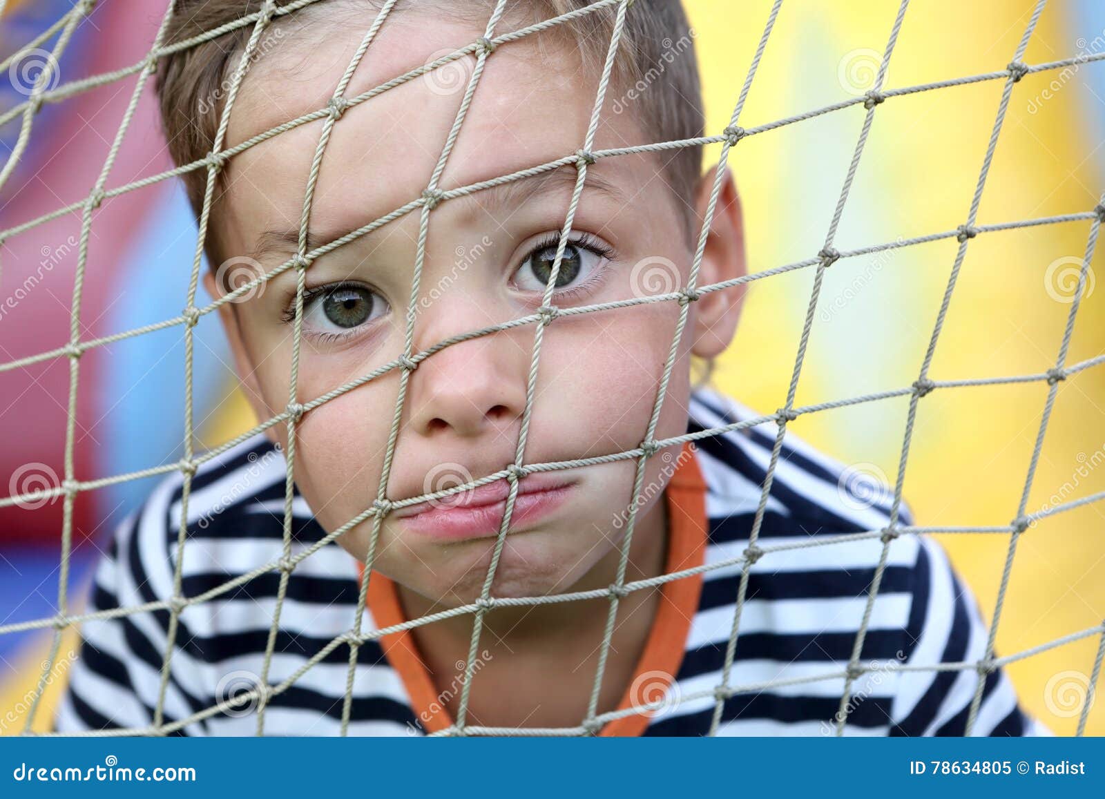 Child face behind net stock image. Image of emotion, despair - 78634805