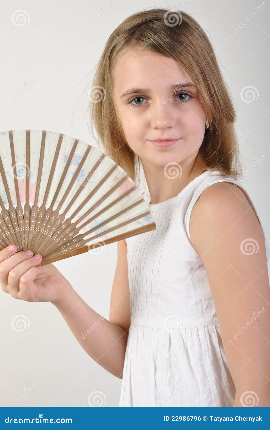 Child with a fan stock photo. Image of person, young - 22986796