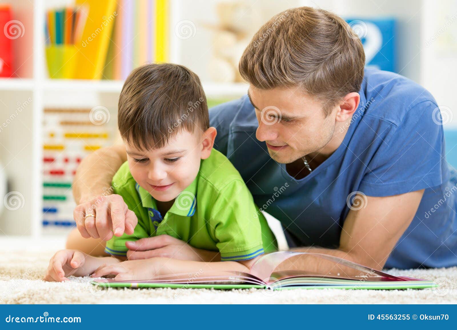 Child and Father Read a Book on Floor at Home Stock Image - Image of ...