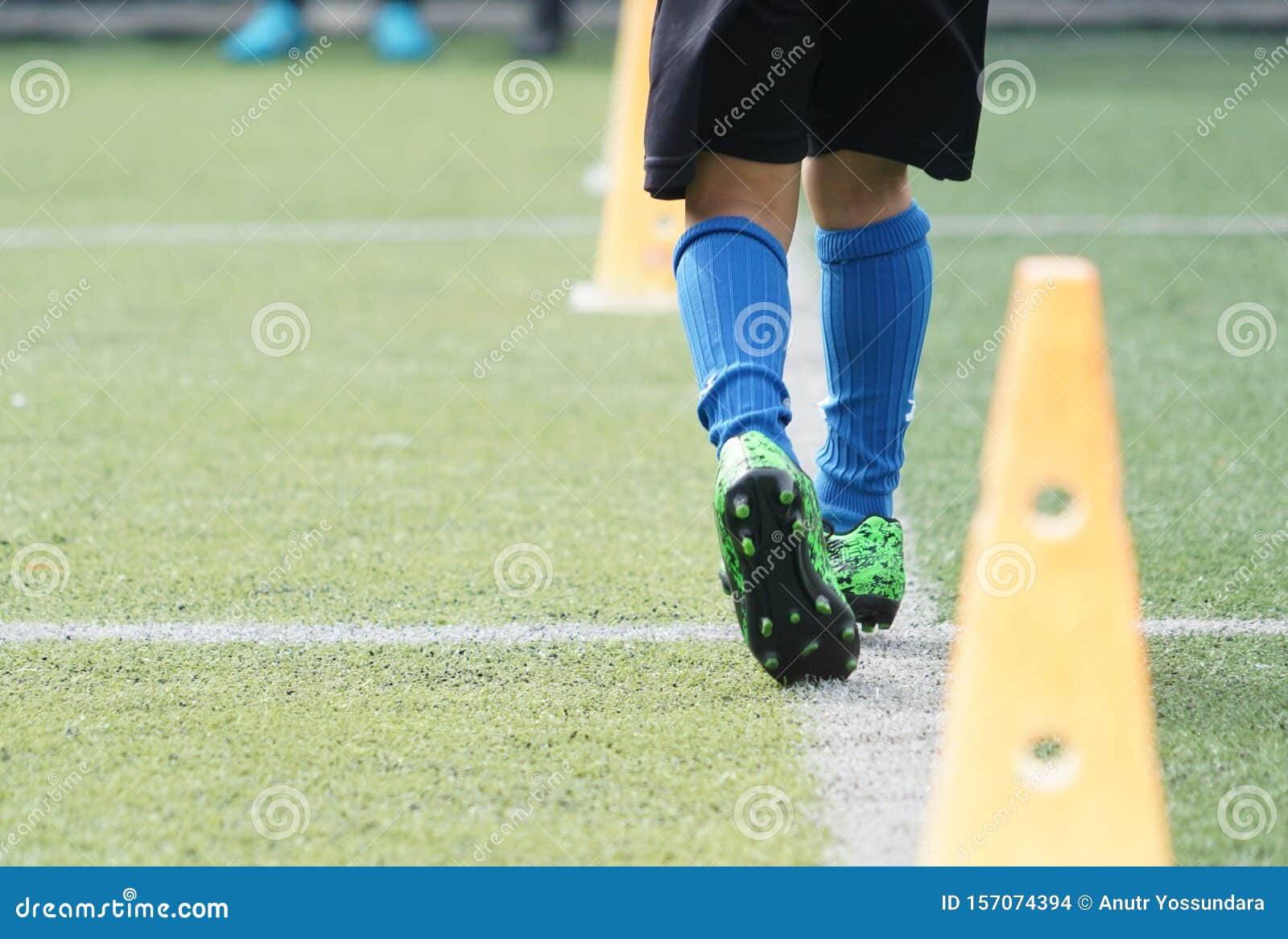 Child Feet Practicing Running and Moving on Soccer Field Stock Photo ...