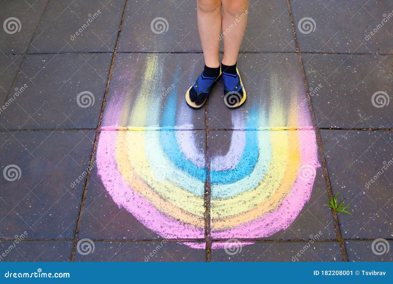 Child Feet Standing on Chalk Drawin Rainbow. Stock Image - Image of ...